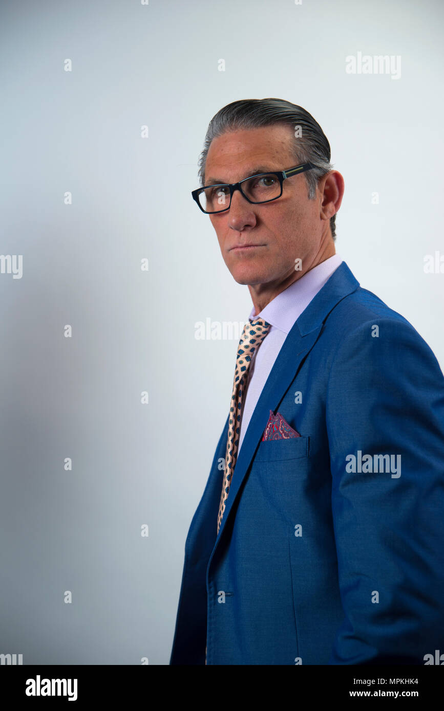 Portrait of a serious business man Stock Photo - Alamy