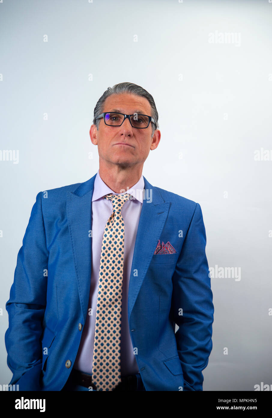 Portrait of a serious business man Stock Photo - Alamy