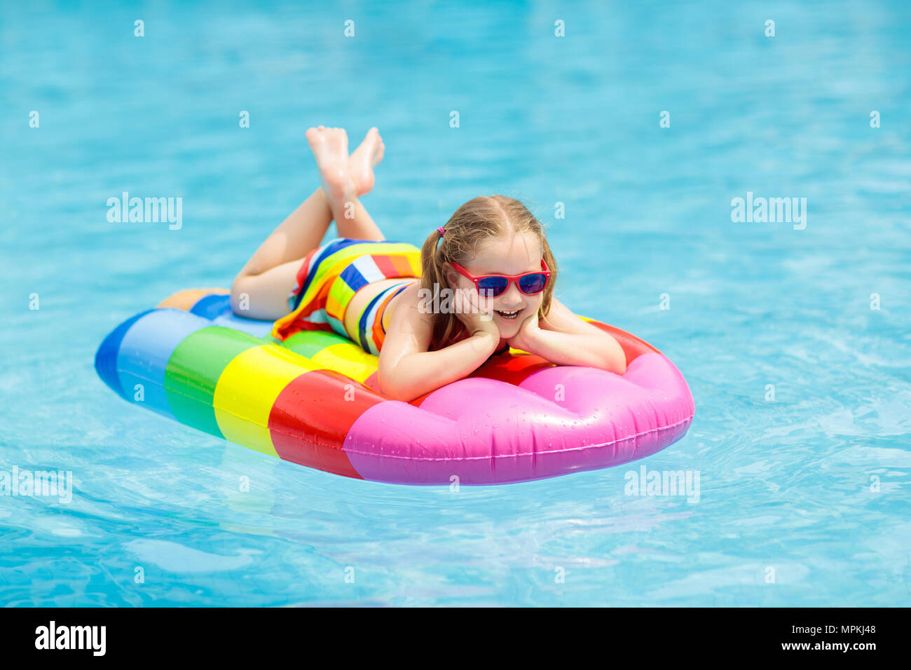 Kids on float hi-res stock photography and images - Alamy