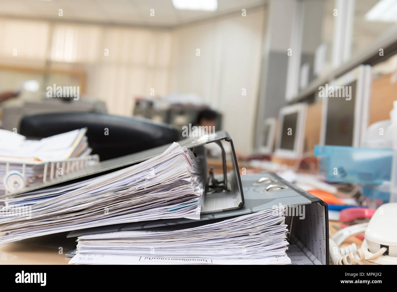 Files stack on the desk in the office Stock Photo - Alamy