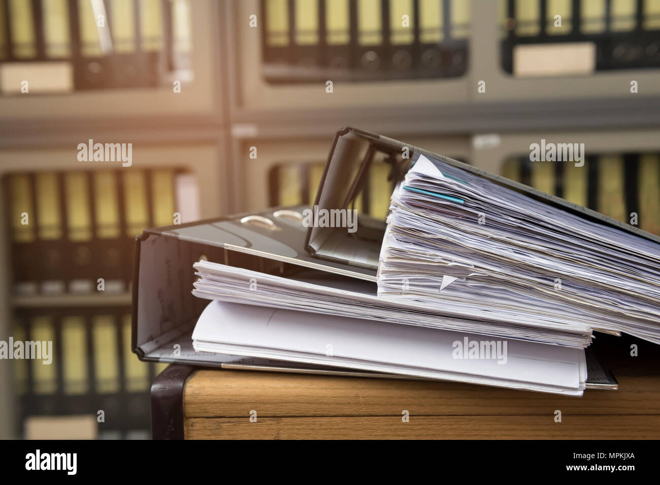 Files stack on the desk in the office Stock Photo - Alamy