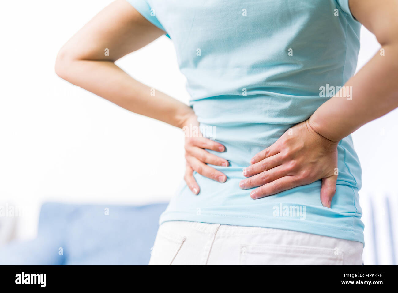 back pain at home. women suffer from backache. healthcare and medical ...