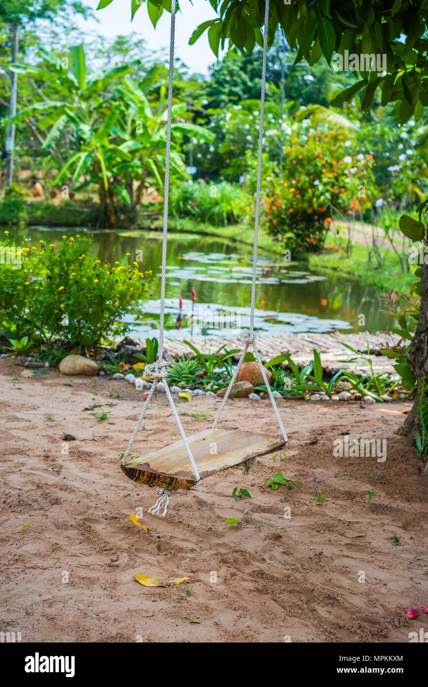 Old wooden tree swing hi-res stock photography and images - Alamy