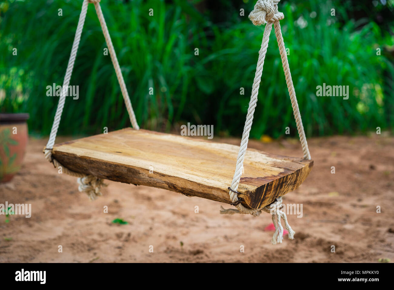 Old wooden tree swing hi-res stock photography and images - Alamy