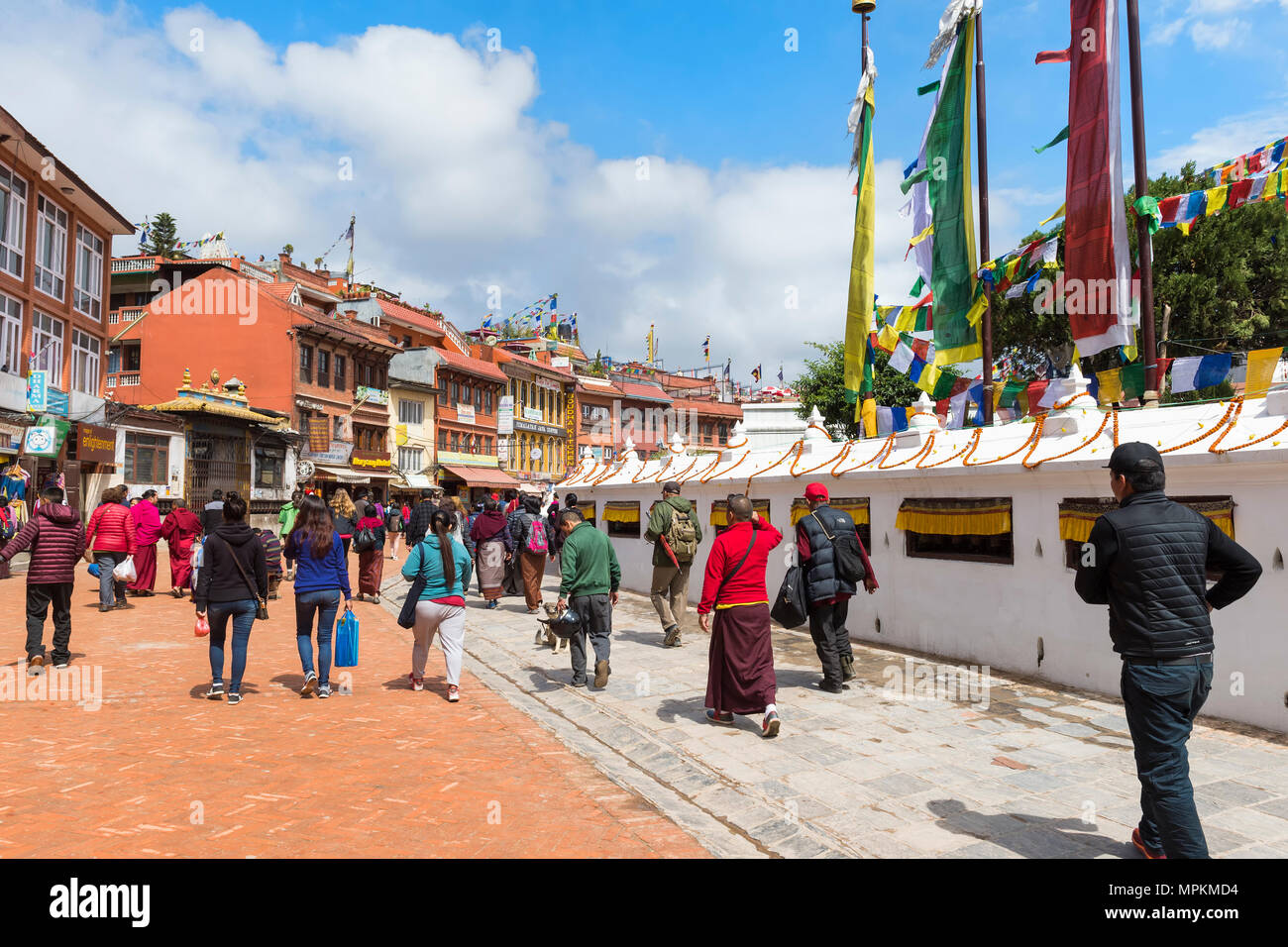 Buddhist pilgrims making the kora or ritual circumnavigation around the ...