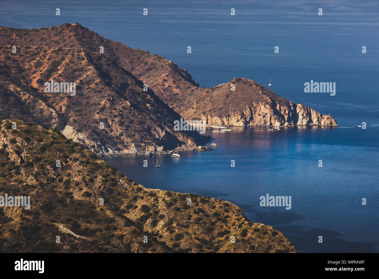 Elevated view of rugged Santa Catalina Island coast with deep blue ...