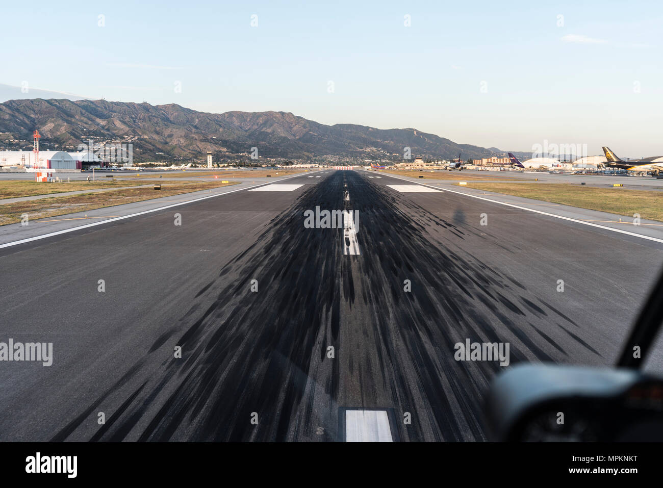 Burbank, California, USA - April, 18, 2018: Skid marks on runway at ...