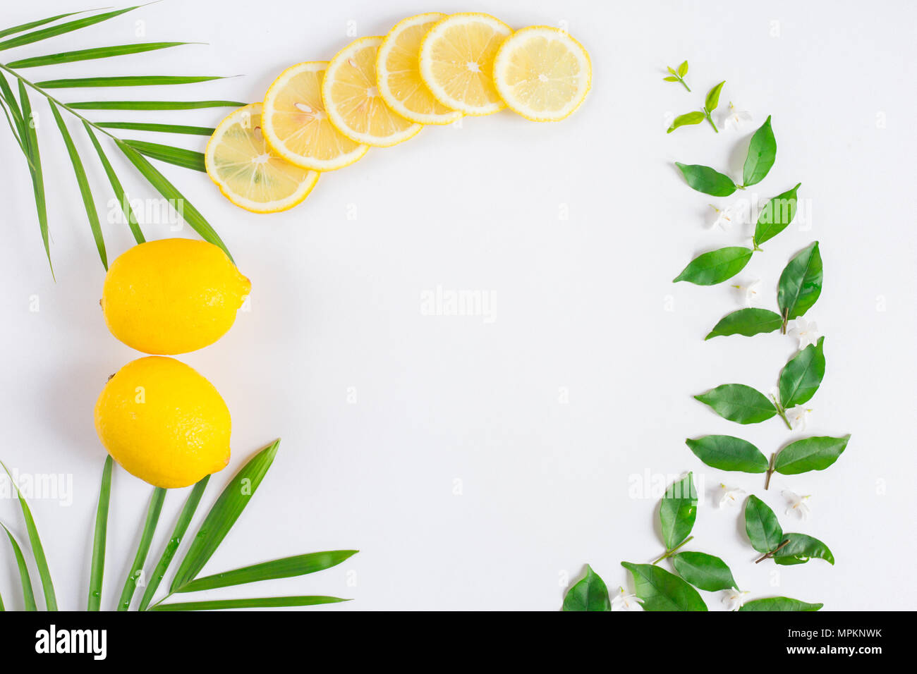 Flat lay image of fresh lemon with lemon slice on white background with ...