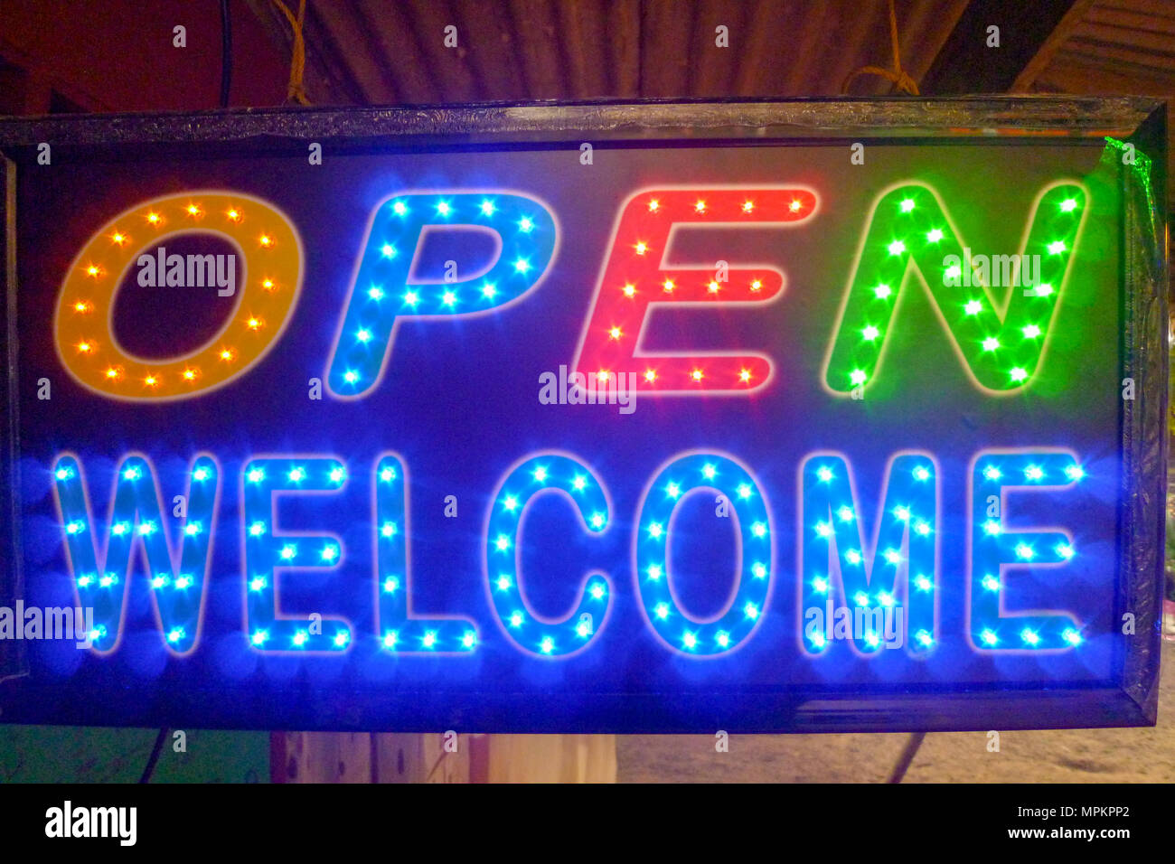 Colorful Open neon sign Stock Photo - Alamy