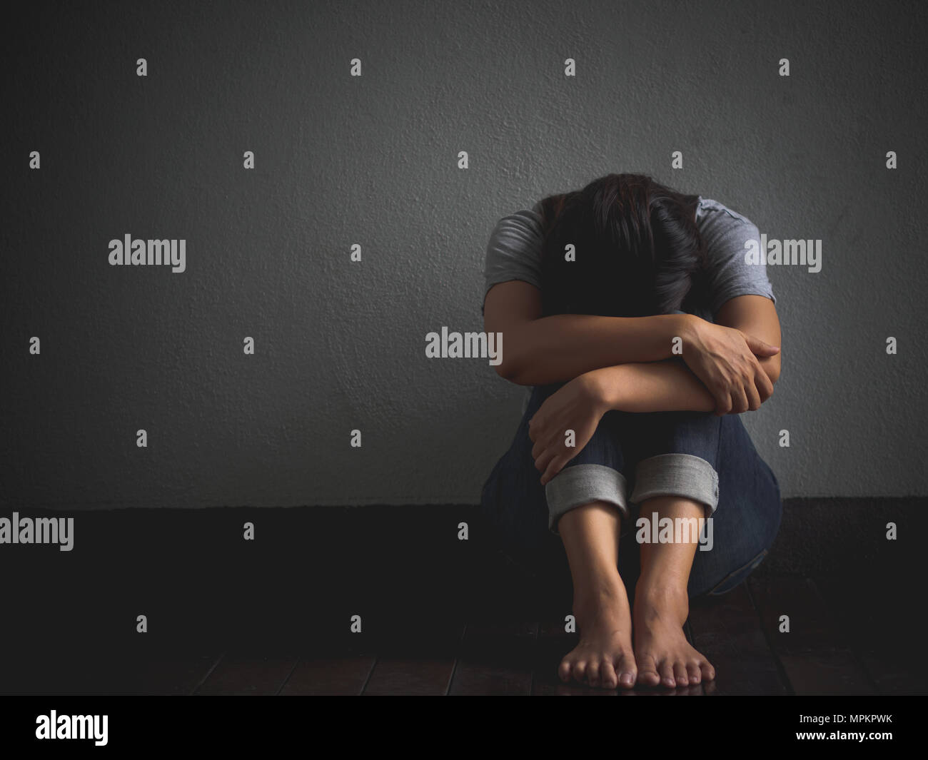 Sad Woman Hug Her Knee And Cry Sad Woman Sitting Alone In A Empty Room