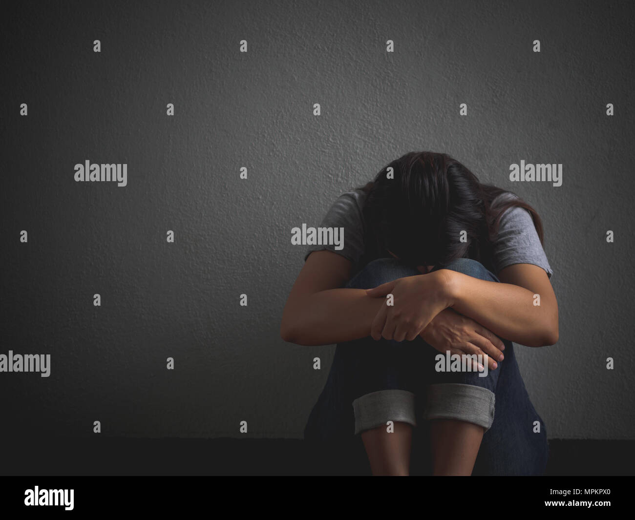 Sad Woman Hug Her Knee And Cry Sad Woman Sitting Alone In A Empty Room