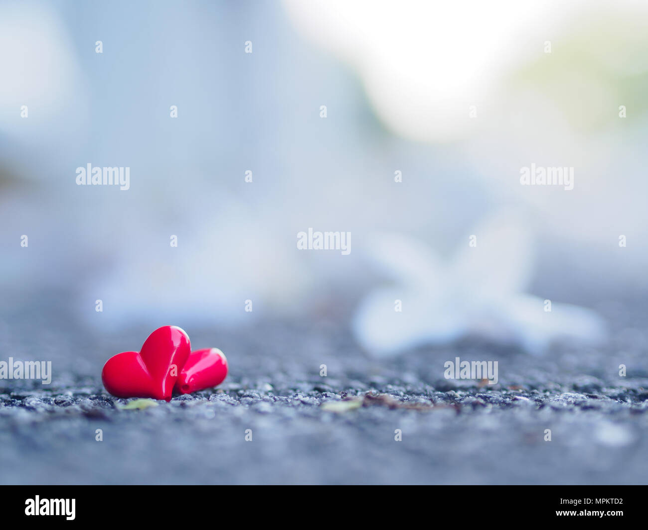 Asphalt road heart symbol background hi-res stock photography and ...