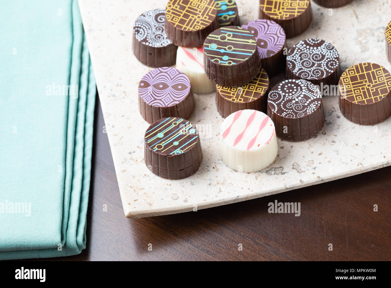 Artisan Fine Chocolate Candy On Serving Dish Stock Photo - Alamy