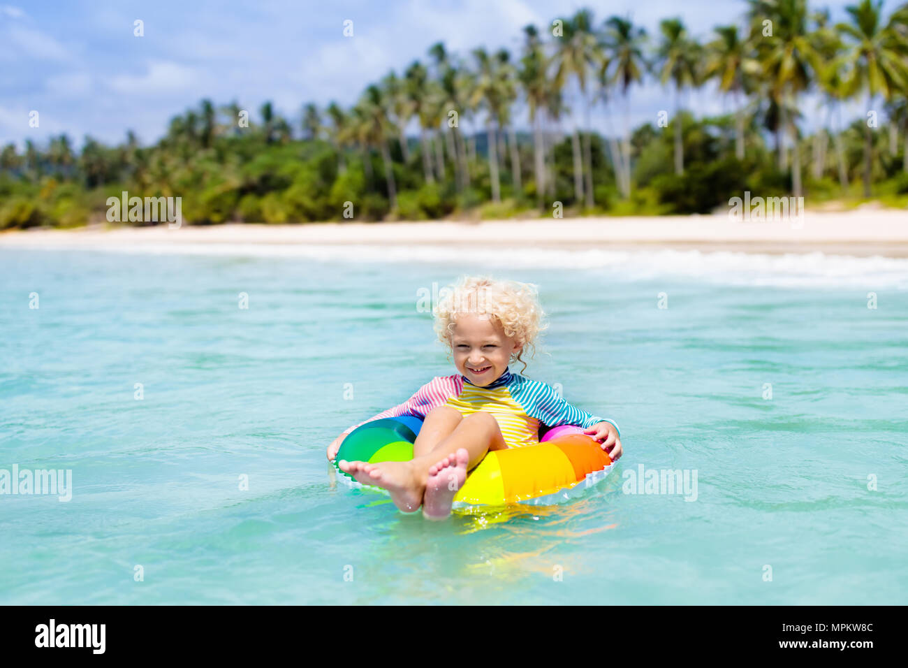 Kids and playing and tropical hi-res stock photography and images - Alamy
