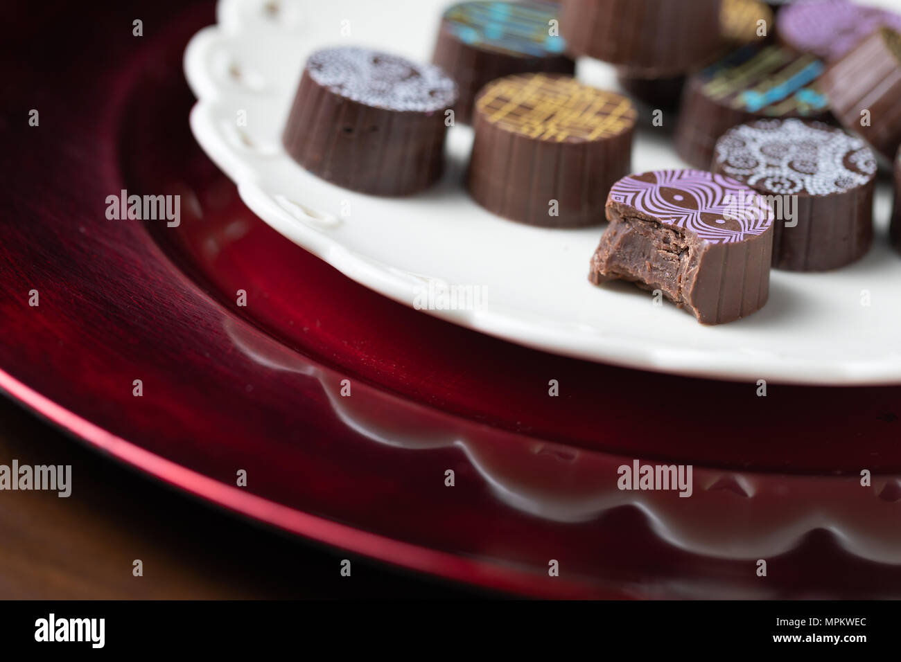 Artisan Fine Chocolate Candy On Serving Dish Stock Photo - Alamy