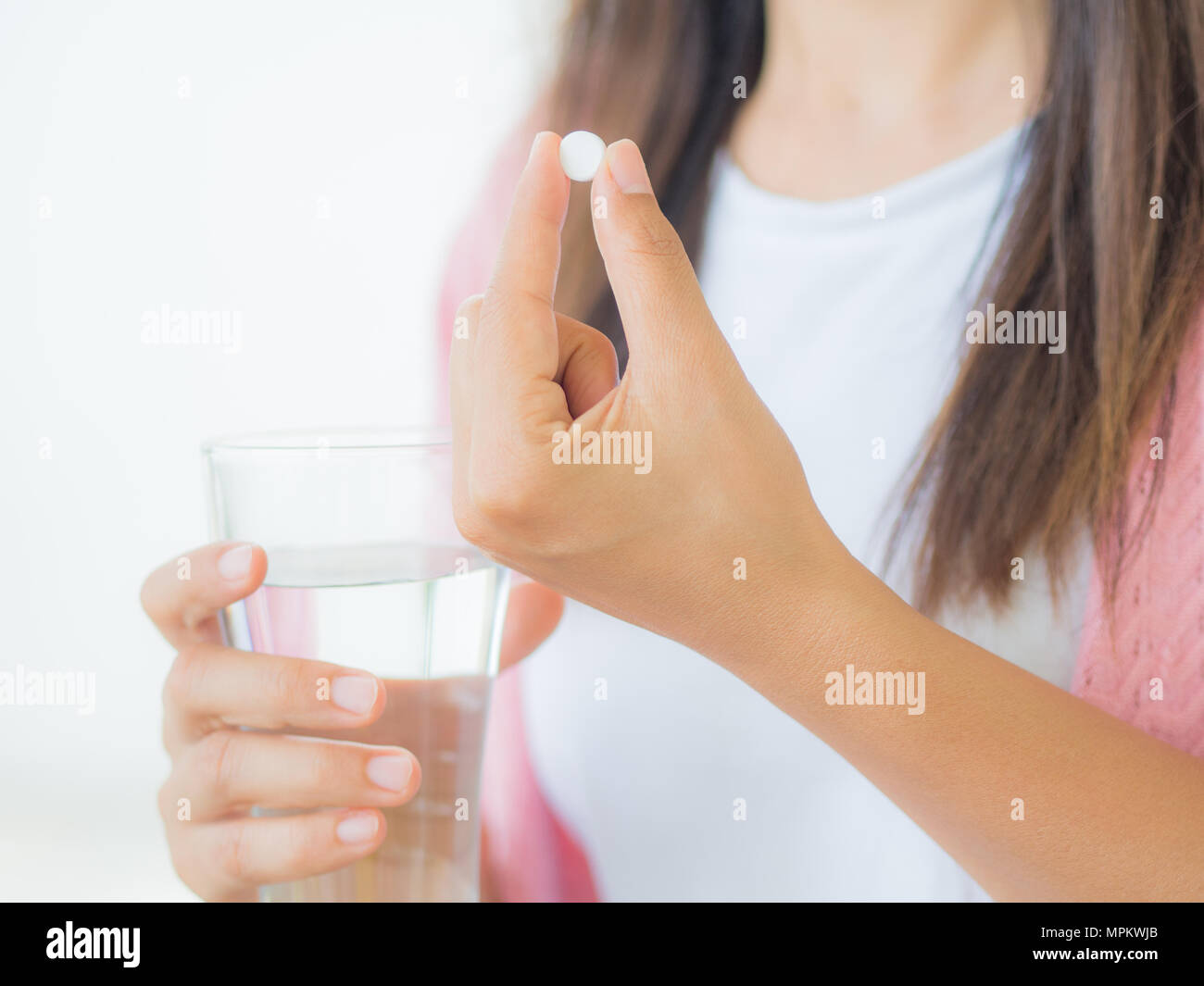 medicine, health care and people concept - close up of woman taking in ...