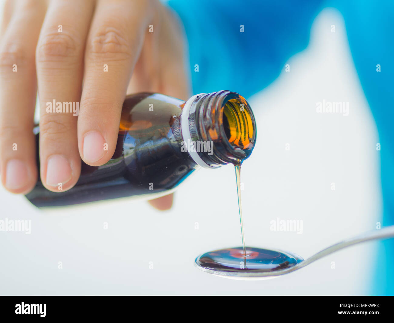 Cough Syrup Measuring Spoon High Resolution Stock Photography and ...