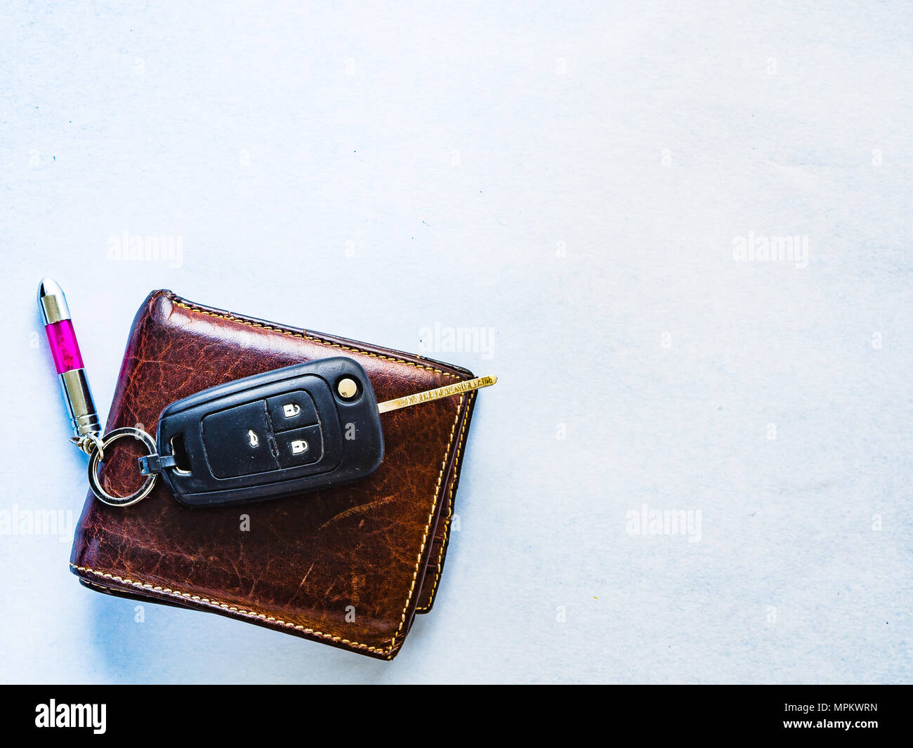 wallet and car key on white paper background with HDR preset Stock ...