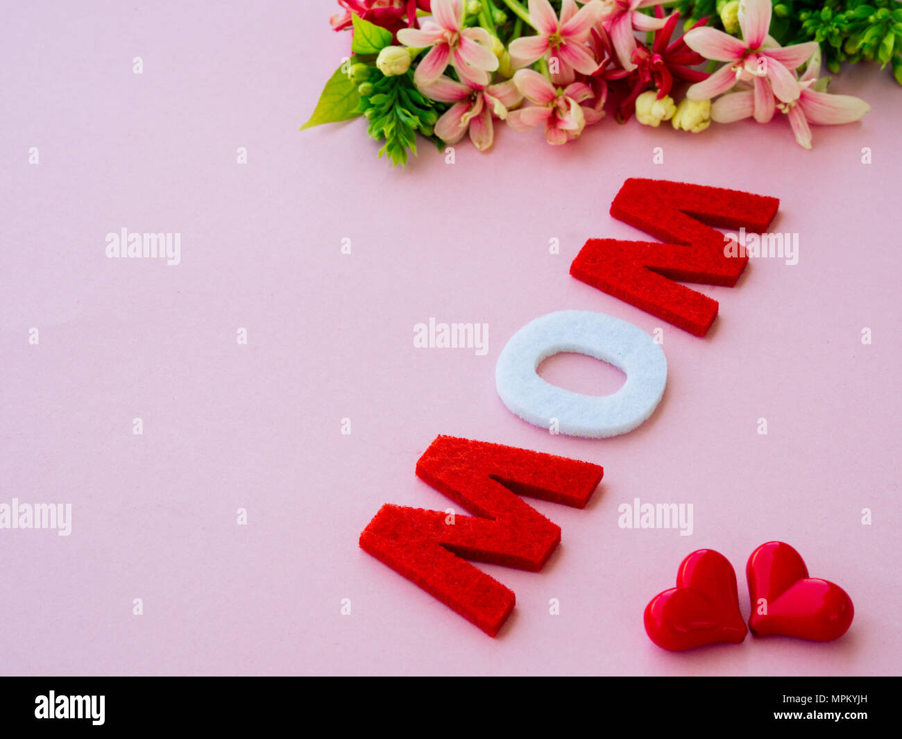 mother's day concept. MOM alphabet with colorful of heart and flower on ...