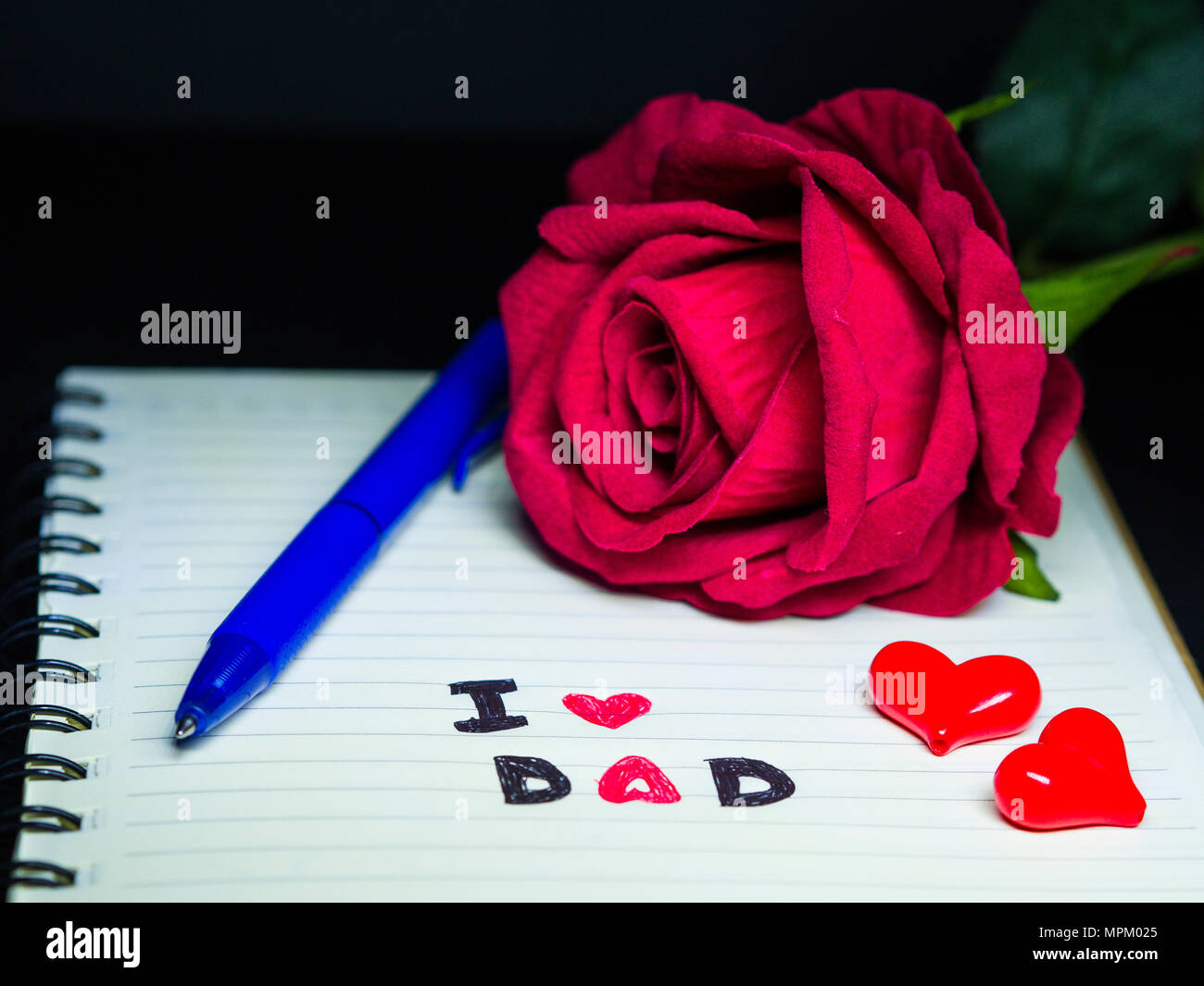 Father's day concept. I LOVE DAD message write on note book with red ...