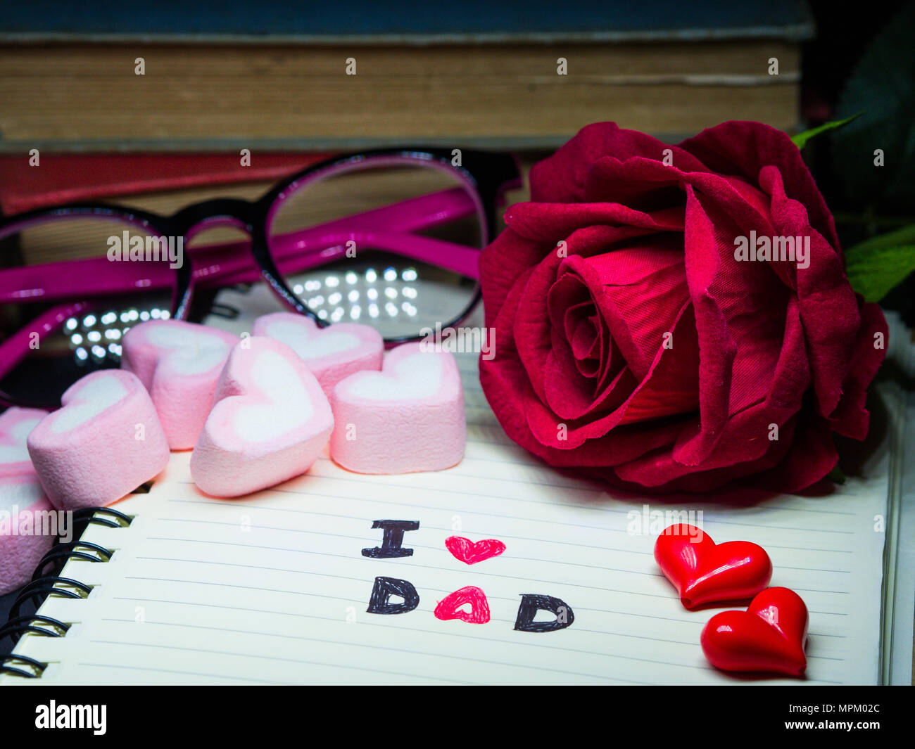 Father's day concept. I LOVE DAD message write on note book with red ...