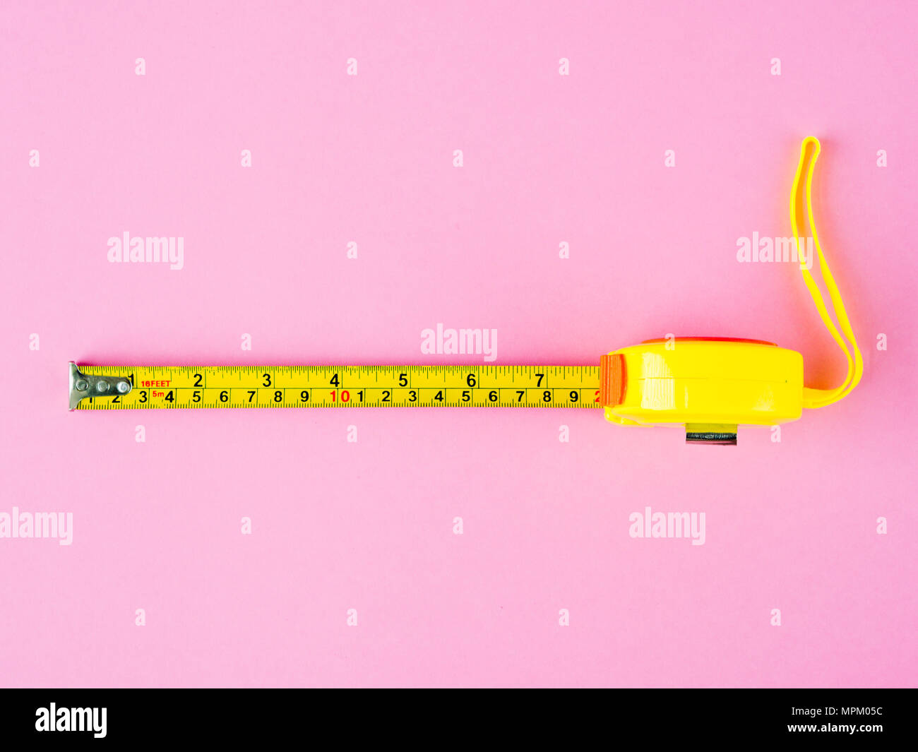 Inch scale pink measuring tape hi-res stock photography and images - Alamy