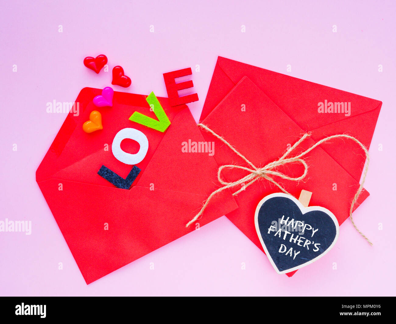 Happy Father's day love letter concept. Opened envelope and many felt ...