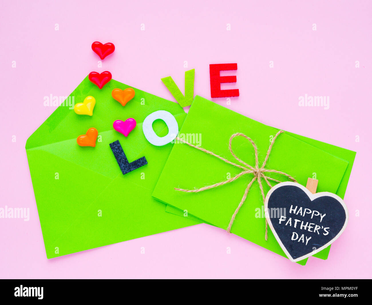 Happy Father's day love letter concept. Opened envelope and many felt ...