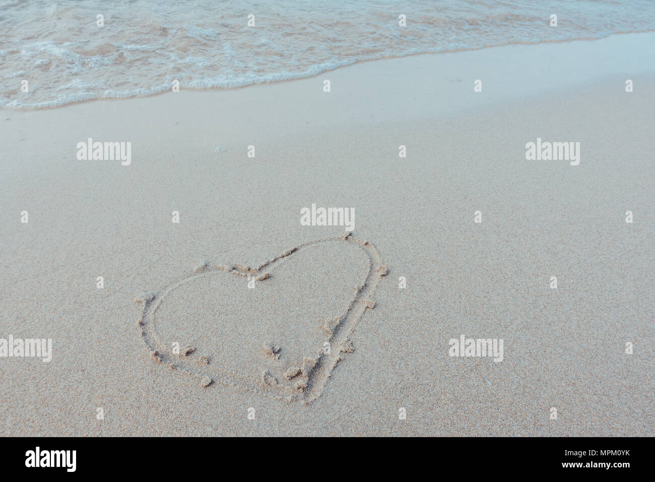 Beautiful background beach with heart in summer. Royalty high-quality ...