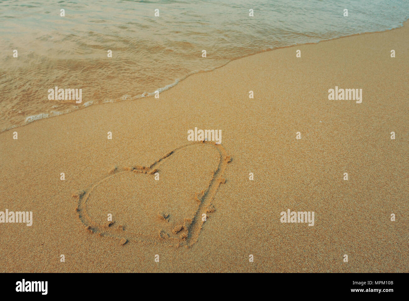 Beautiful background beach with heart in summer. Royalty high-quality ...