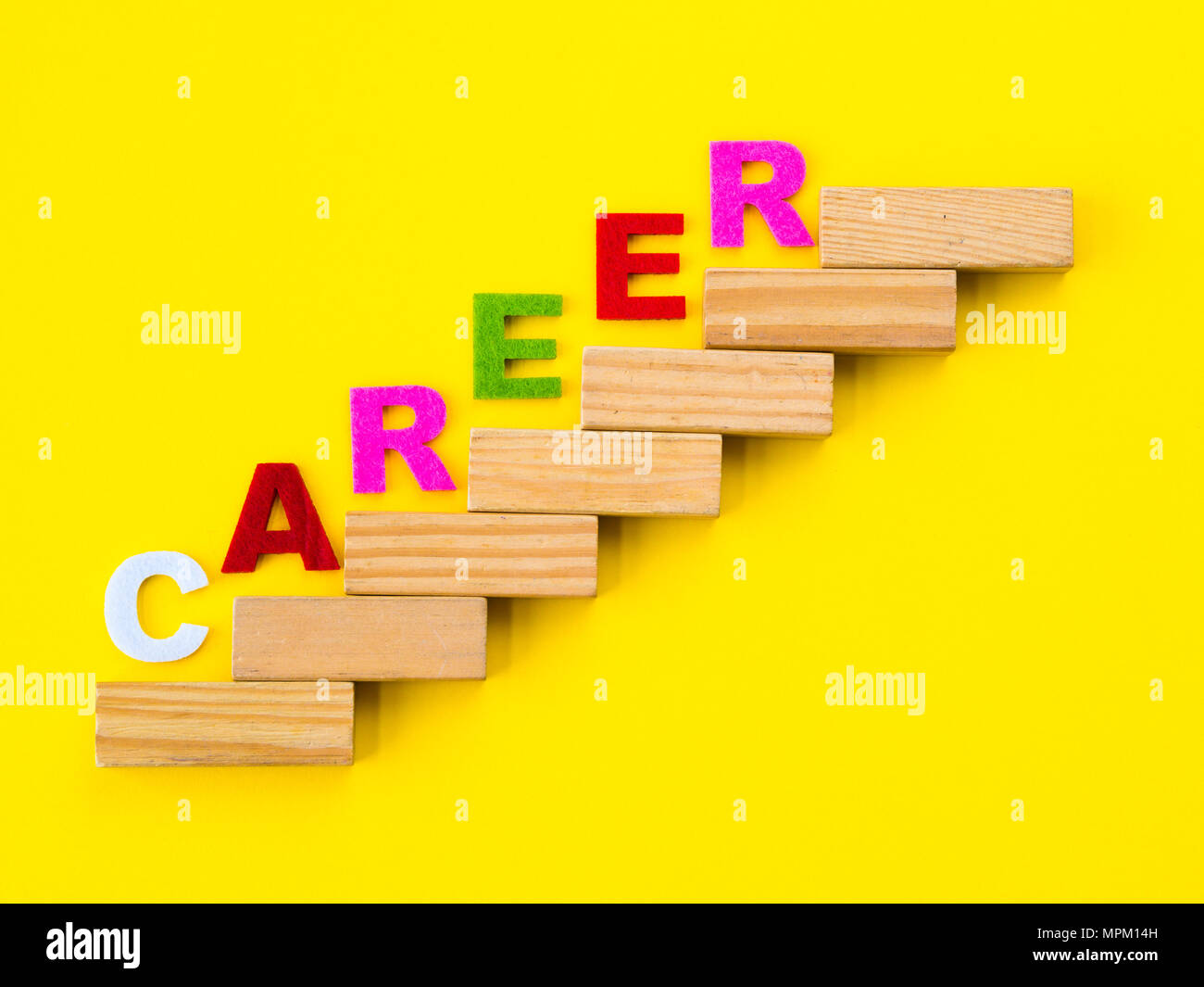 Wood block stacking as step stair with colorful of "CAREER" word on it ...