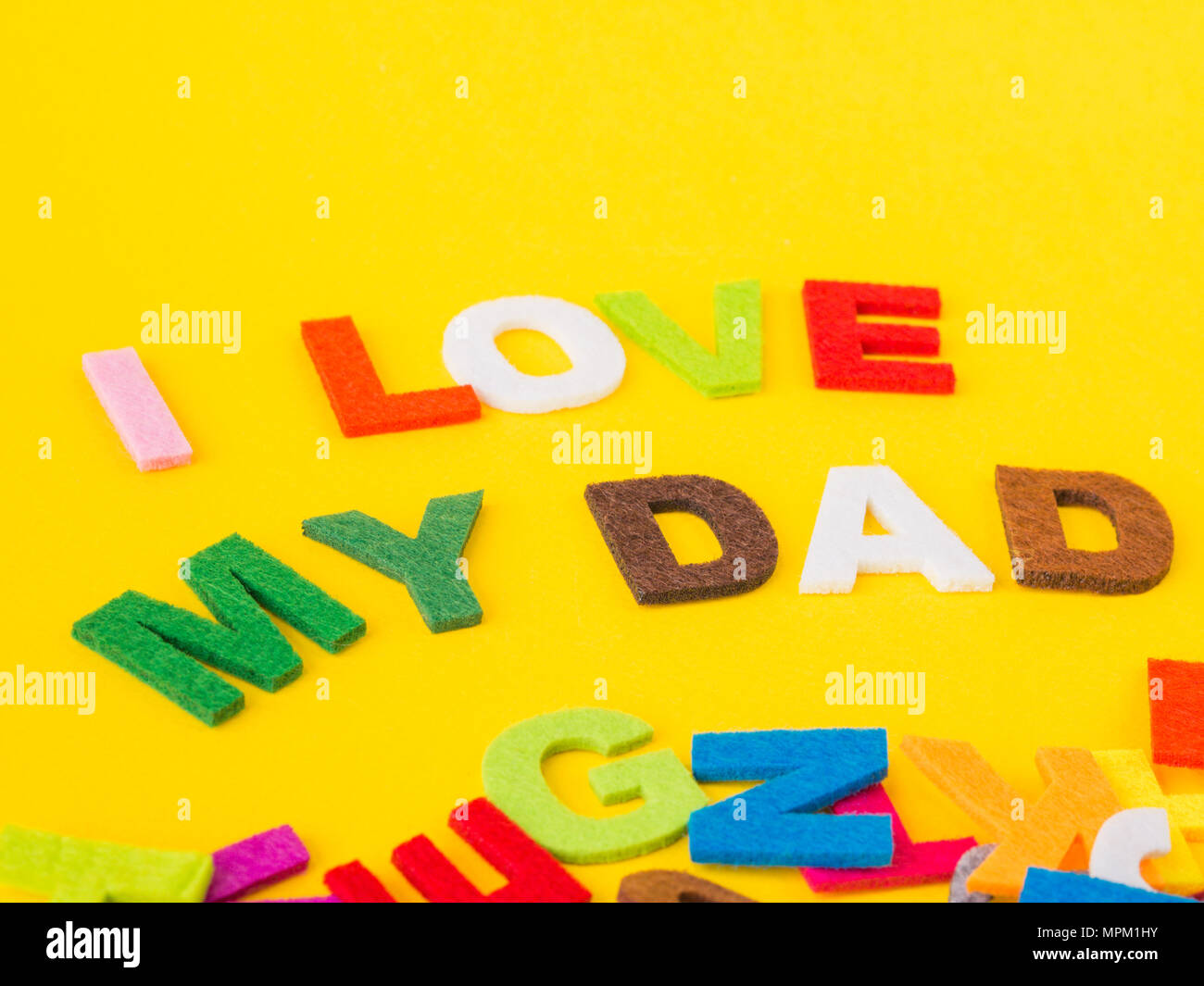 Father's day concept. I LOVE MY DAD alphabet on yellow background Stock ...