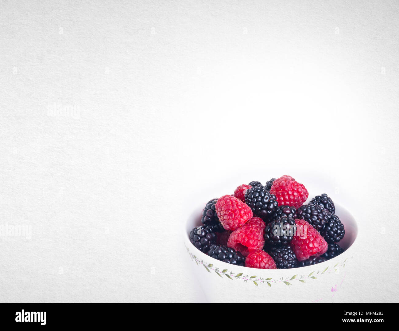 raspberry and blackberry on white isolated background Stock Photo - Alamy
