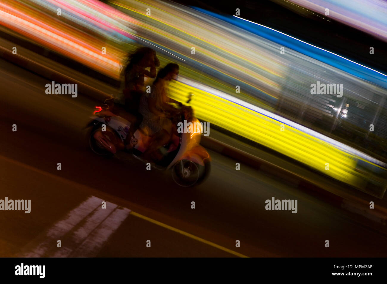 Girl on moped hi-res stock photography and images - Alamy