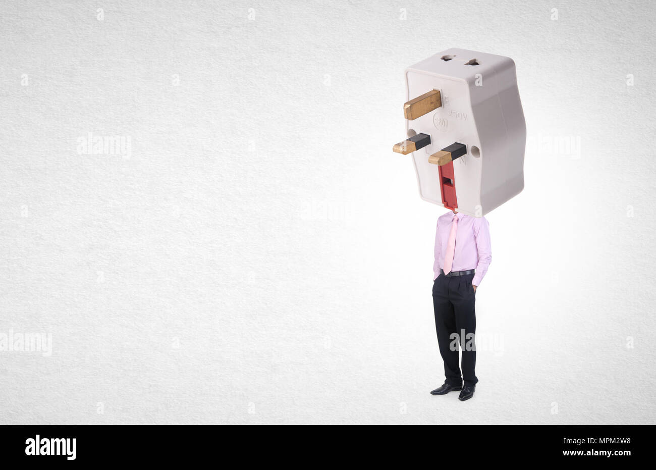 man or plug headed man with concept on background Stock Photo - Alamy