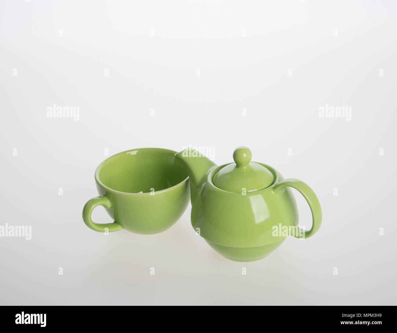 Tea pot set or Porcelain tea pot and cup on background Stock Photo - Alamy