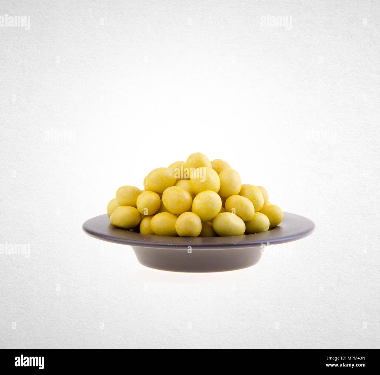 Peanutes or Crispy Coated Peanuts on background Stock Photo - Alamy