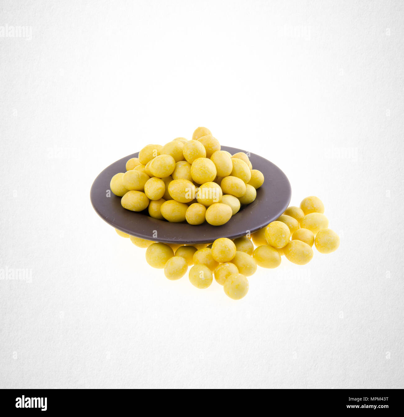 Peanutes or Crispy Coated Peanuts on background Stock Photo - Alamy