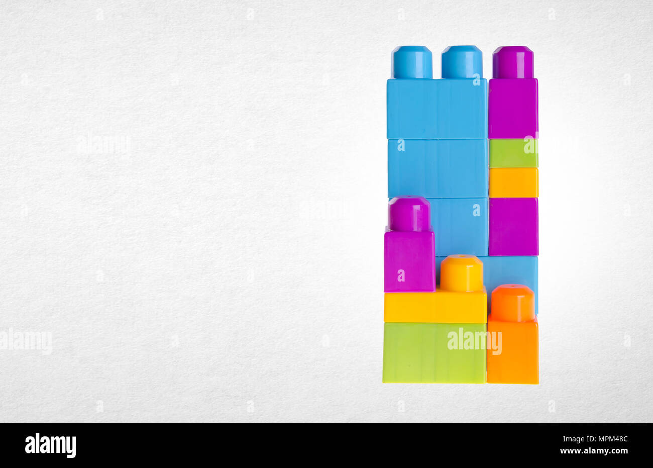 Building blocks or Plastic building blocks on background Stock Photo ...