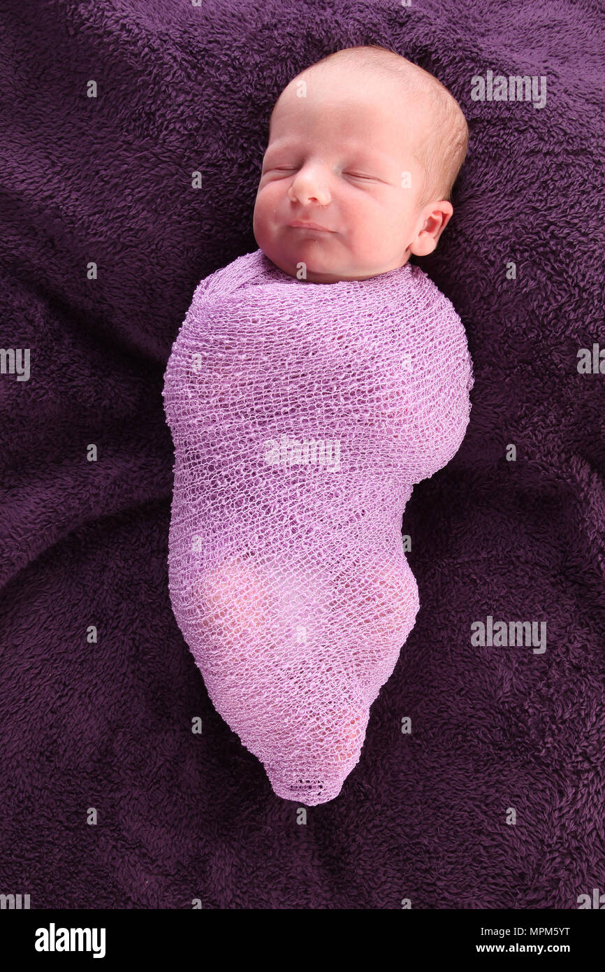 Swaddled infant hi-res stock photography and images - Alamy