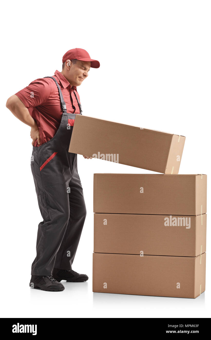 Full length profile shot of a mover lifting a package and experiencing ...