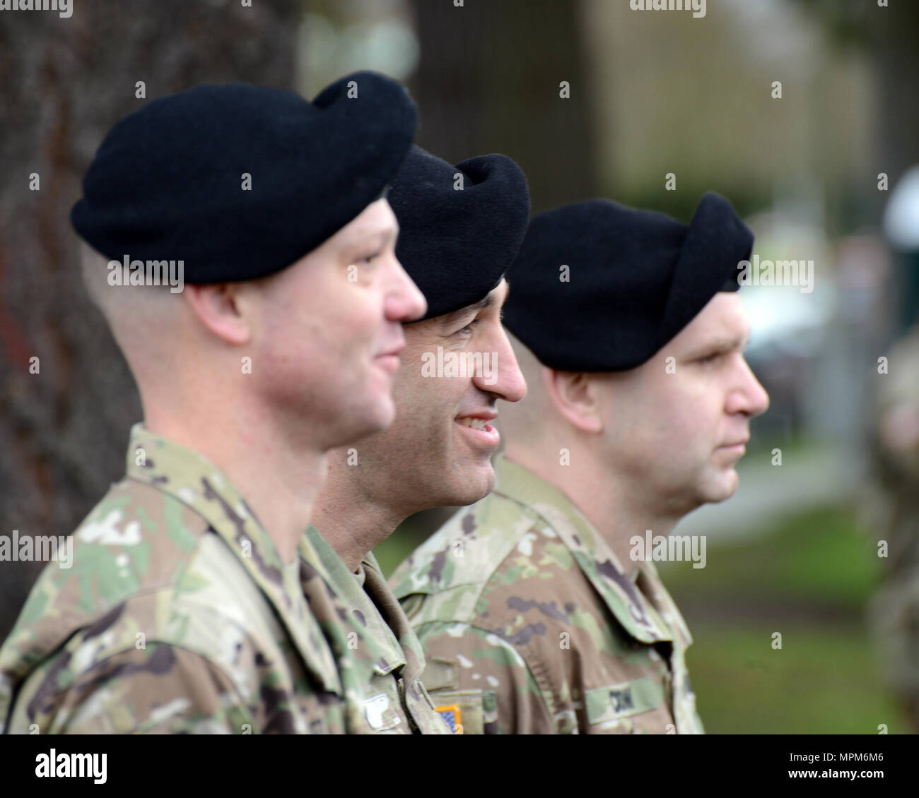COL David C. Foley, 1-2 Stryker Brigade commander (center) waits with ...