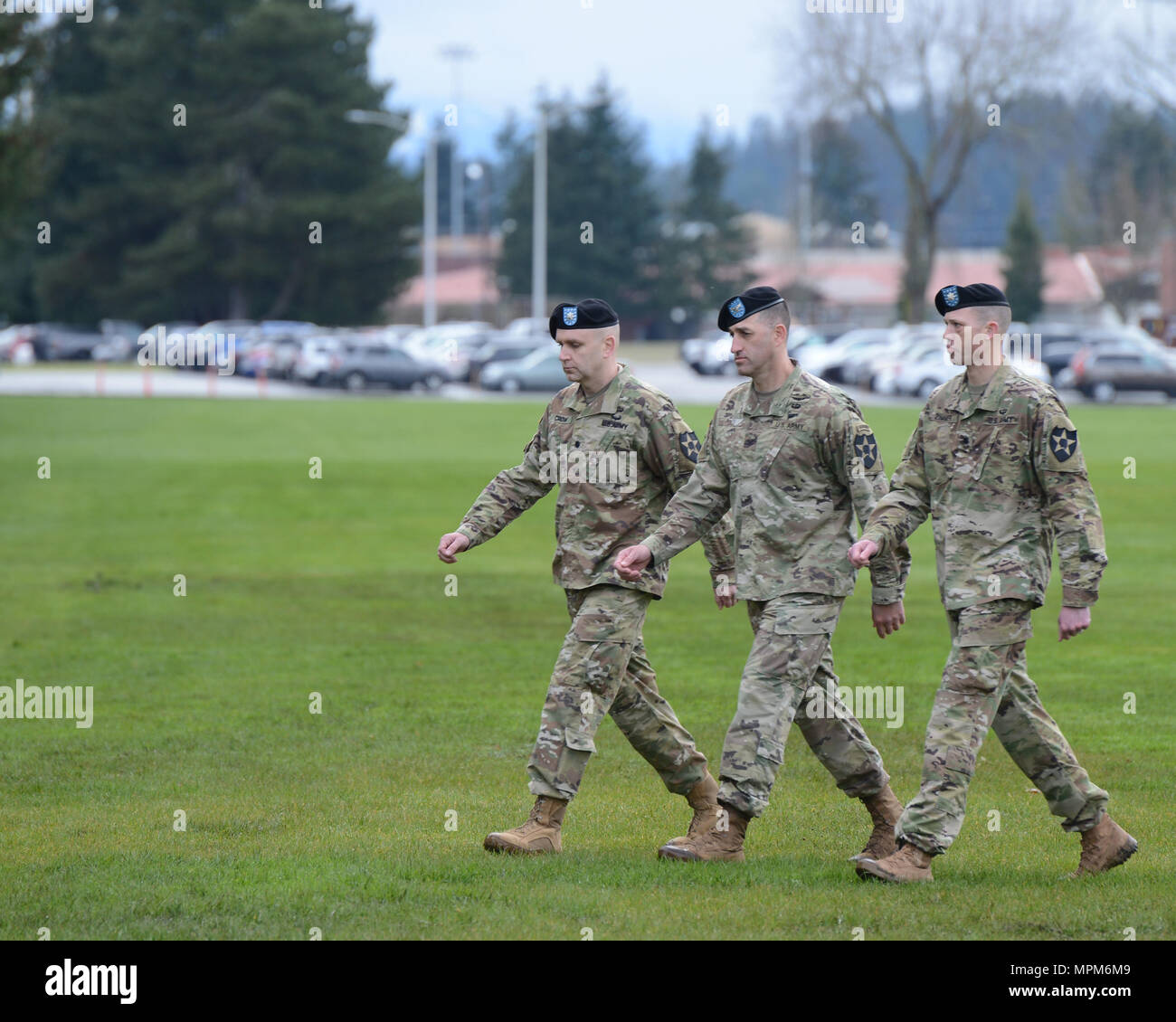 COL David C. Foley, 1-2 Stryker Brigade commander (center) walks with ...
