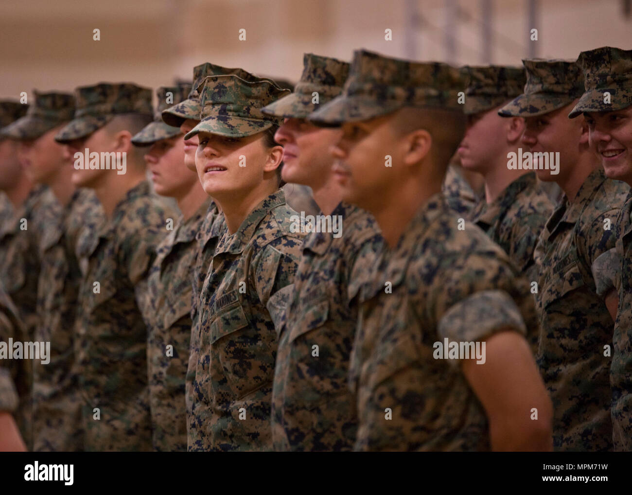 U.S. Marine Corps Pfc. Maria Daume, center, a mortarman assigned to ...