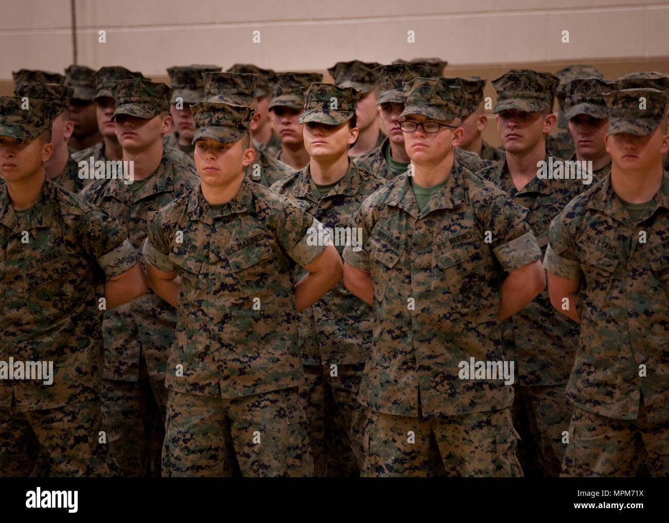 U.S. Marine Corps Pfc. Maria Daume, center, a mortarman assigned to ...