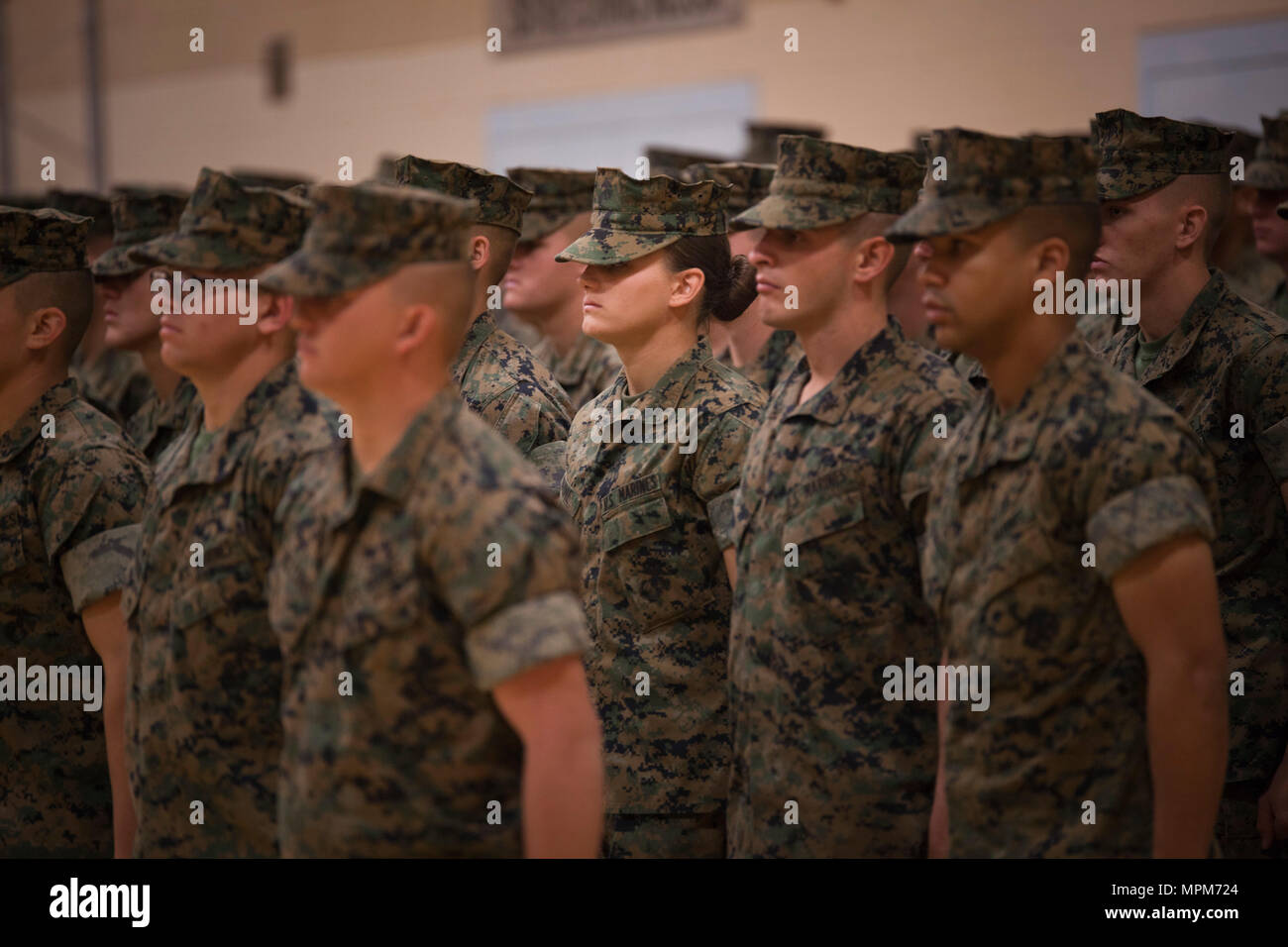 U.S. Marine Corps Pfc. Maria Daume, center, a mortarman assigned to ...