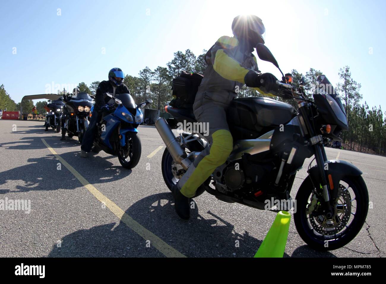 Riders queue at the start of the rider-skills-refresher course at ...