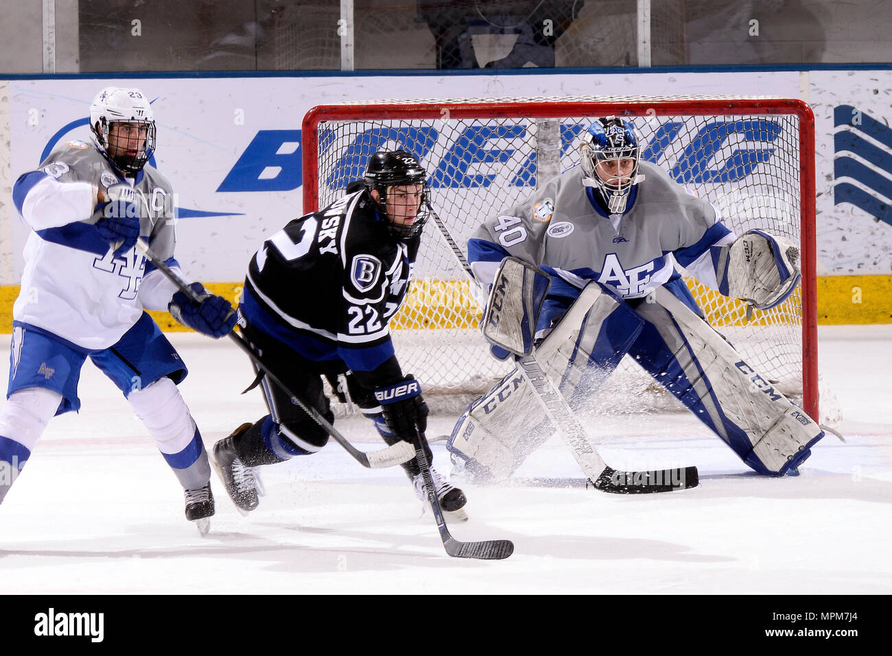Shane Starrett, a sophomore goalie, anticpates a pass to Bentley's ...