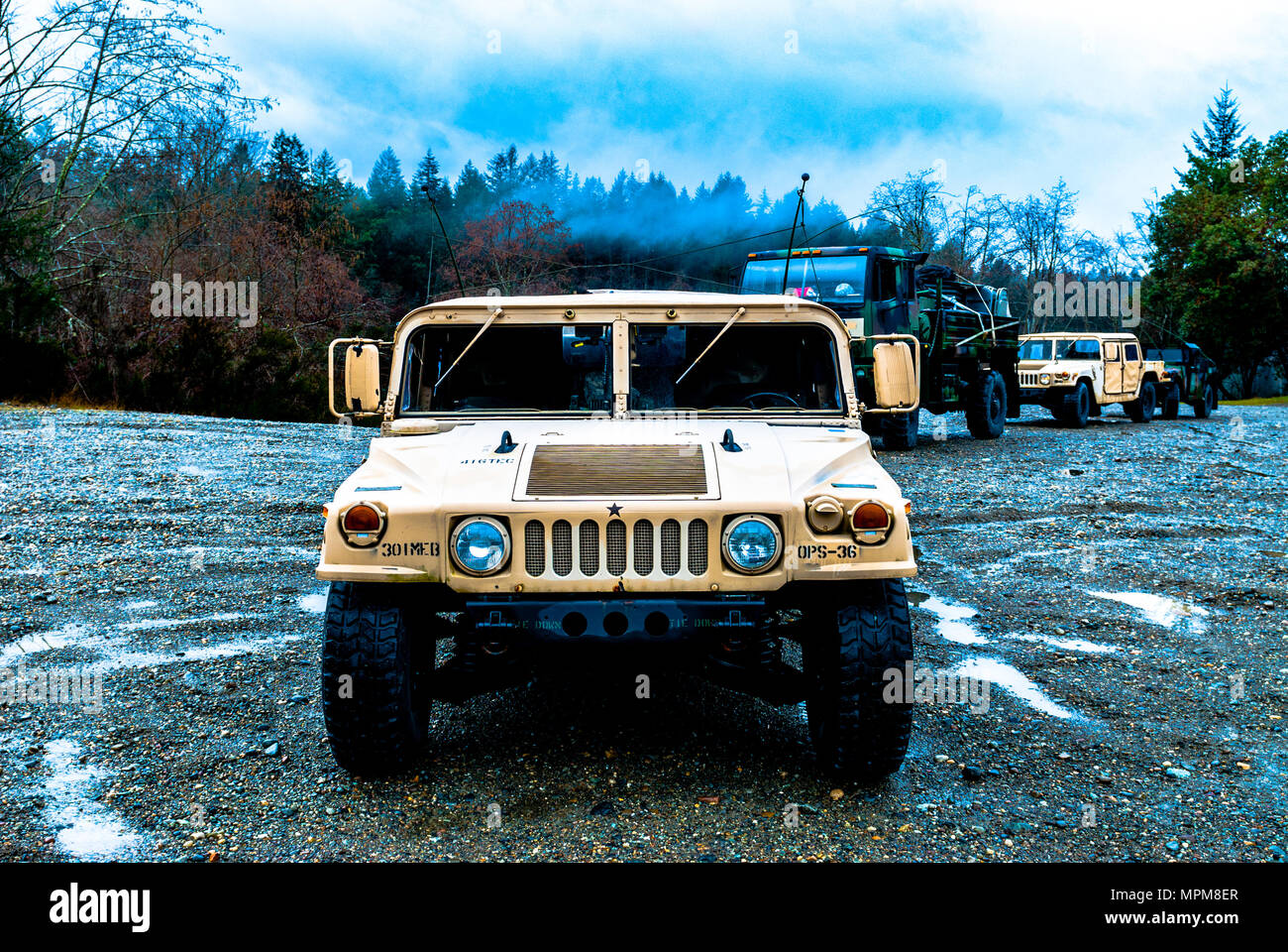 Soldiers from the 301st Maneuver Enhancement Brigade prepare to depart ...