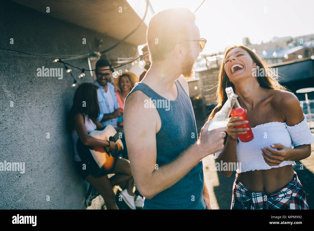 Friends having fun outdoors and are happy Stock Photo - Alamy